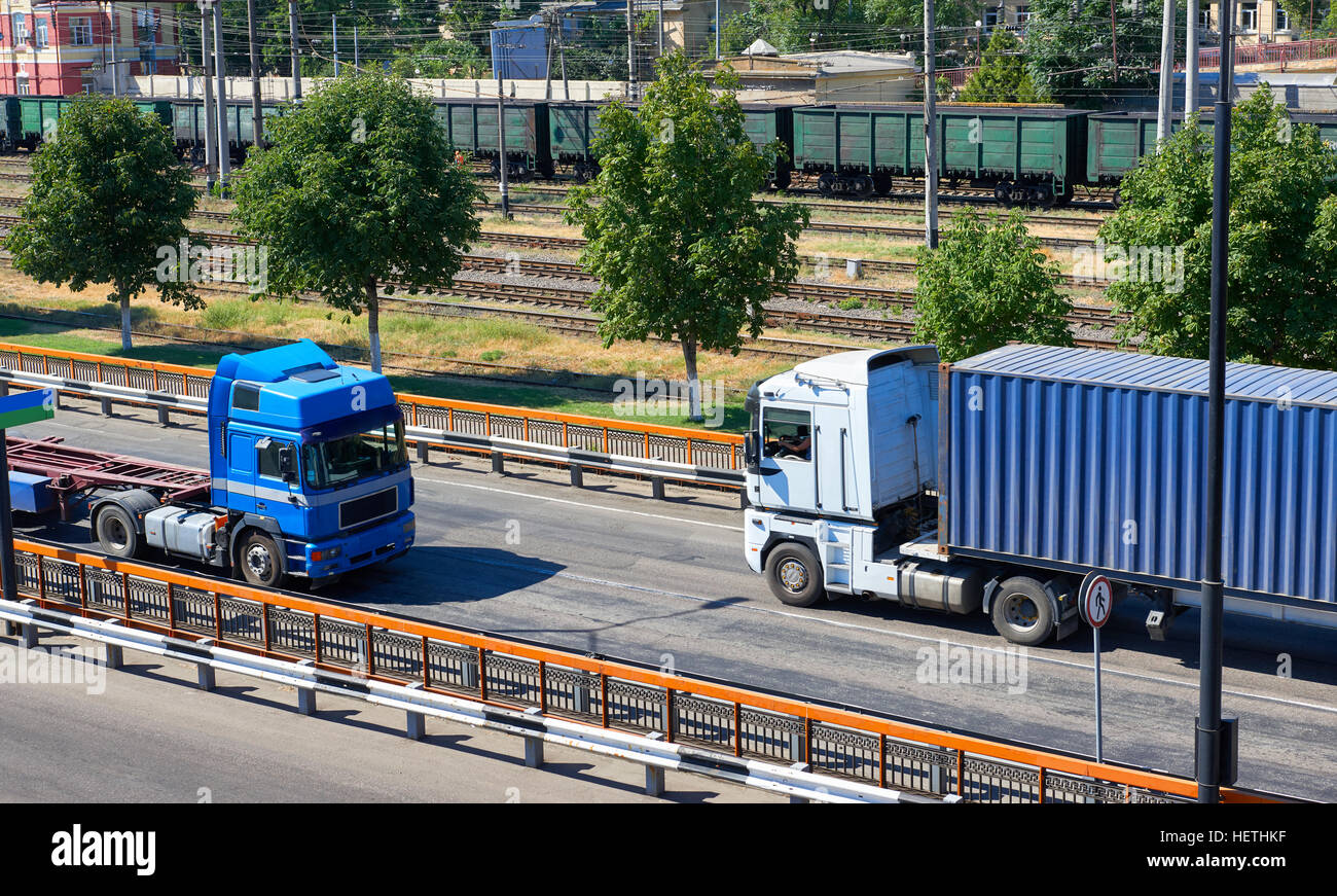 truck on road in sea port, industrial infrastructure and railroad ...