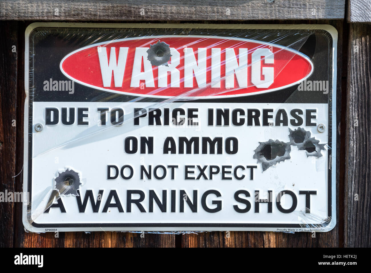 Warning shot sign on a cabin in the Adirondack Mountains of New York ...