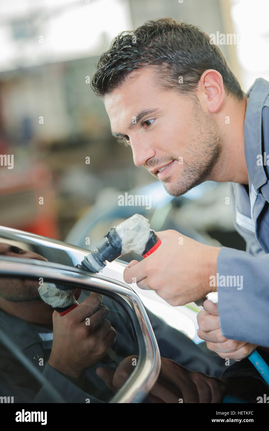 Smiling automotive assembly line worker hi-res stock photography and ...