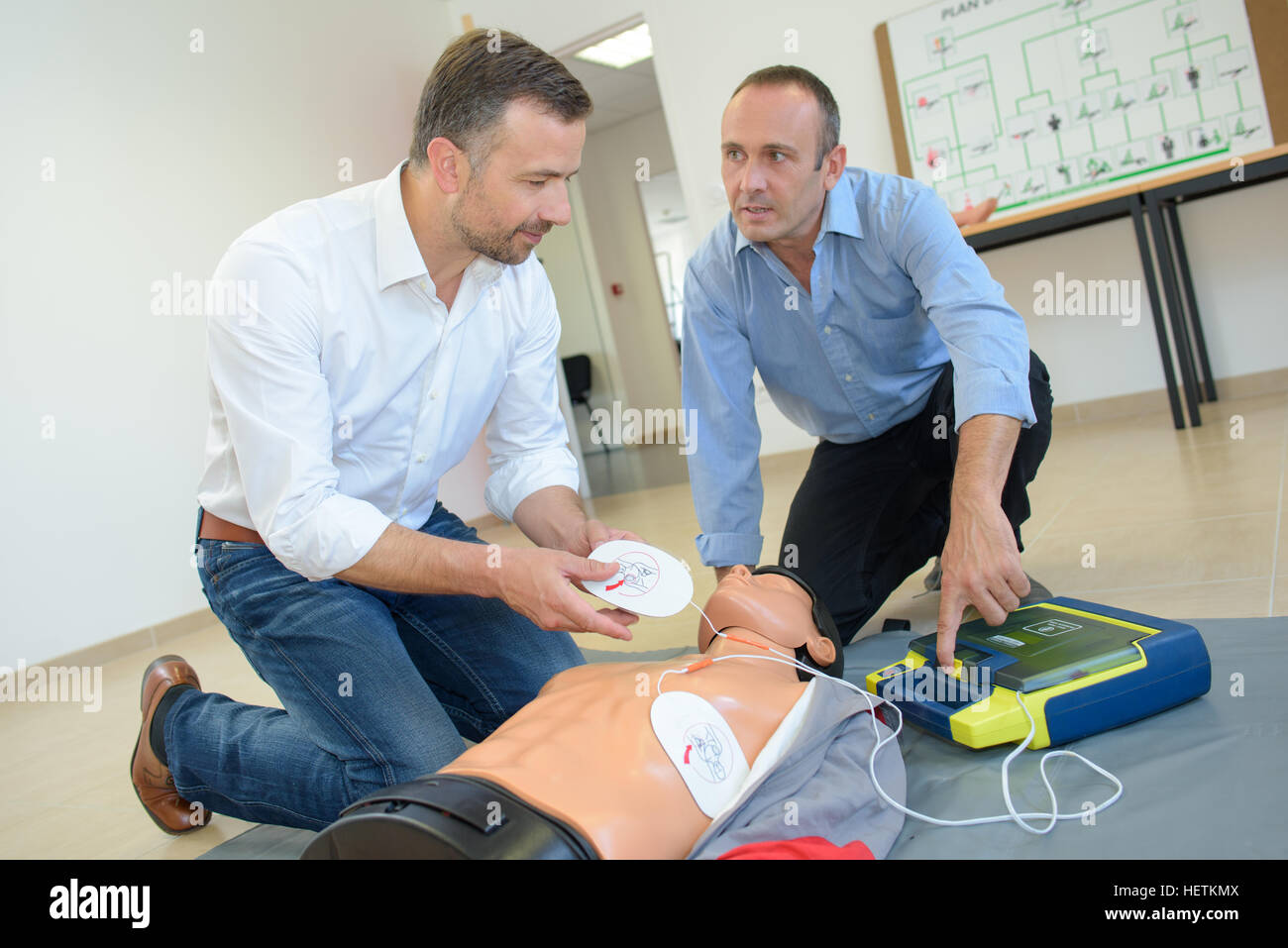 men installing some wiring Stock Photo - Alamy