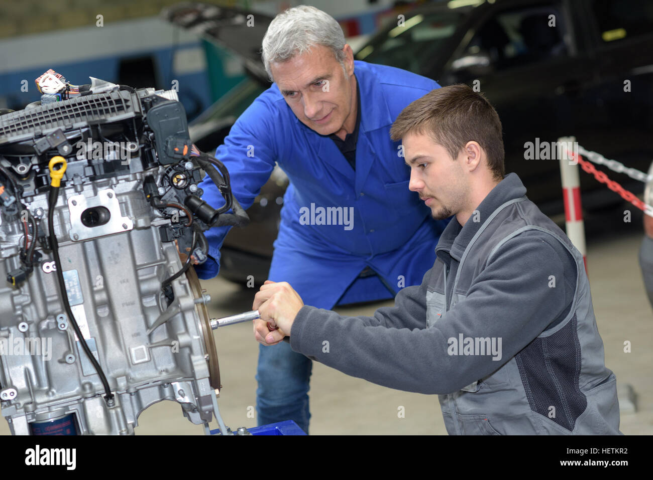 Young apprentice mechanic boss hi-res stock photography and images - Alamy