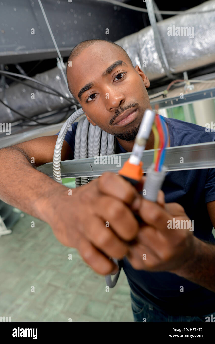 African electrician hi-res stock photography and images - Alamy