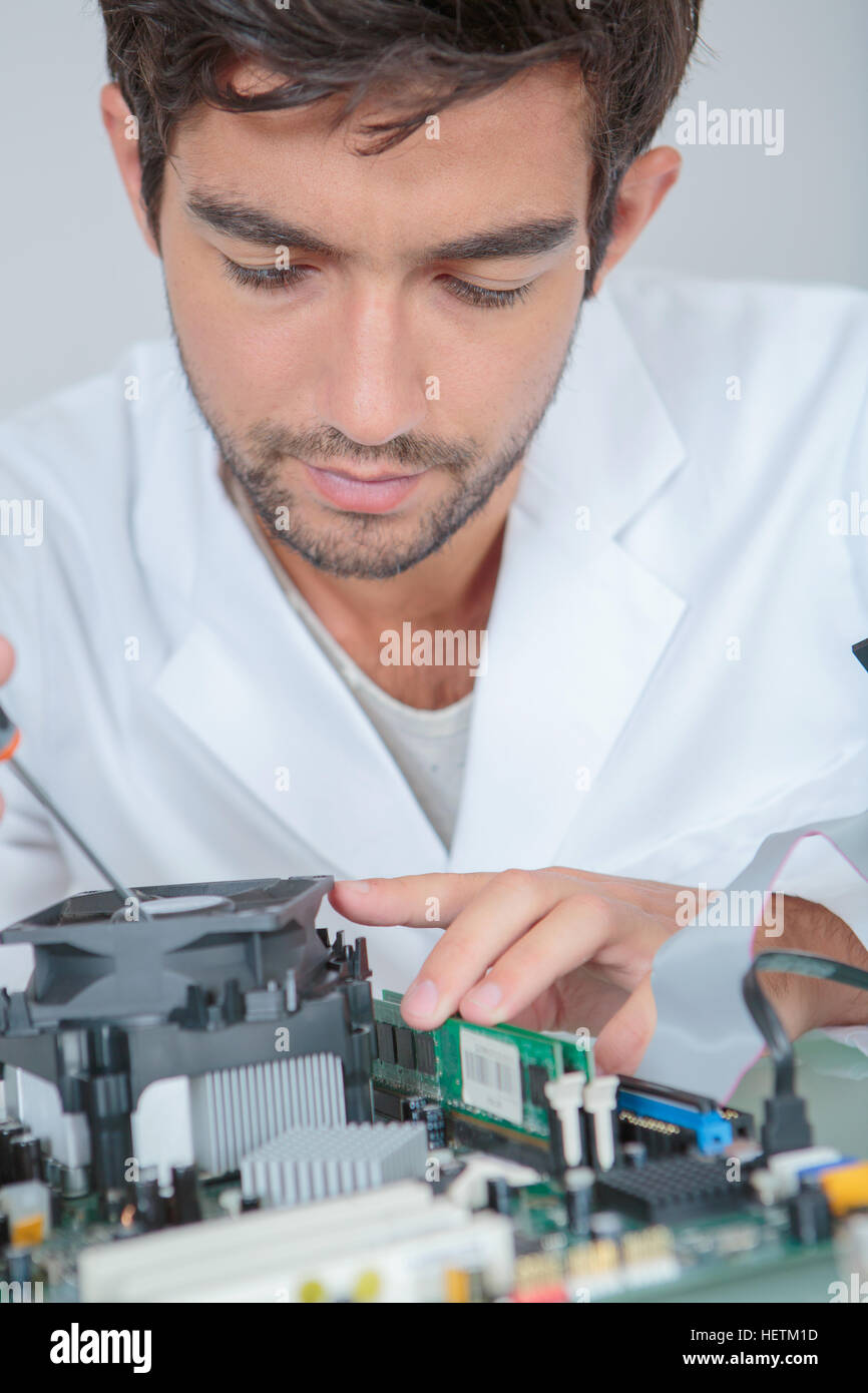 solving electronic defect Stock Photo - Alamy