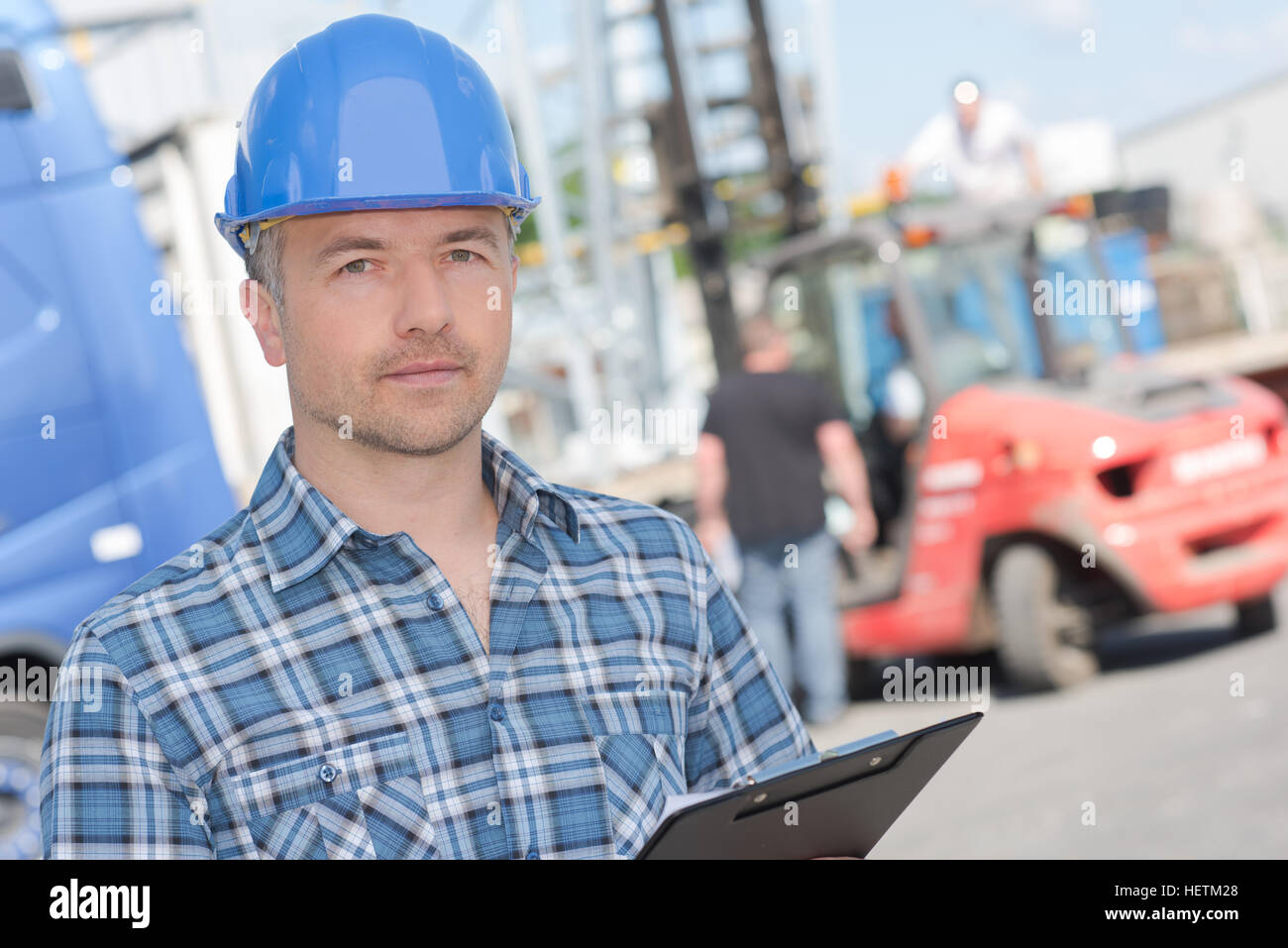 Delivery person clipboard manager hi-res stock photography and images ...