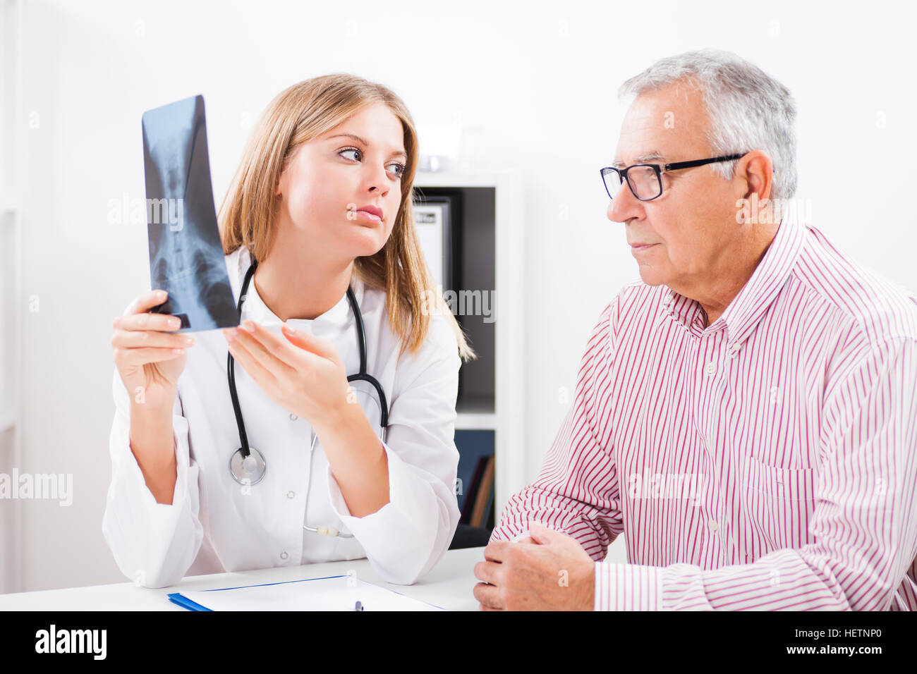 Doctor and patient Stock Photo - Alamy