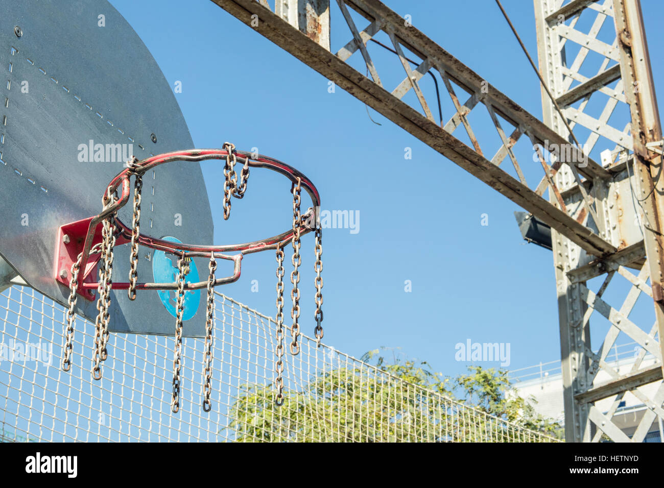 Detail of basketball hoop with iron net Stock Photo - Alamy