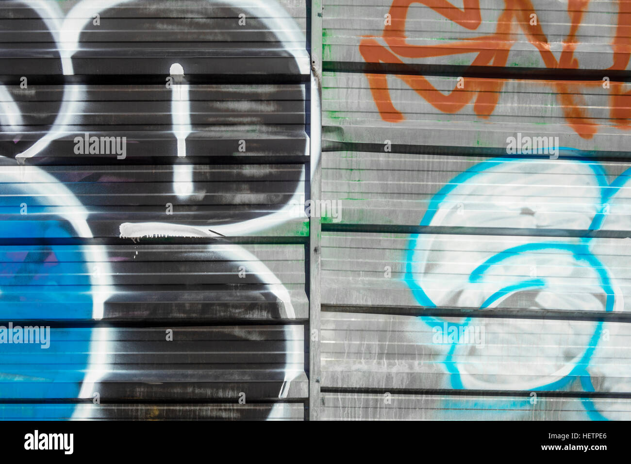 Close up of graffiti on a metallic fence Stock Photo - Alamy