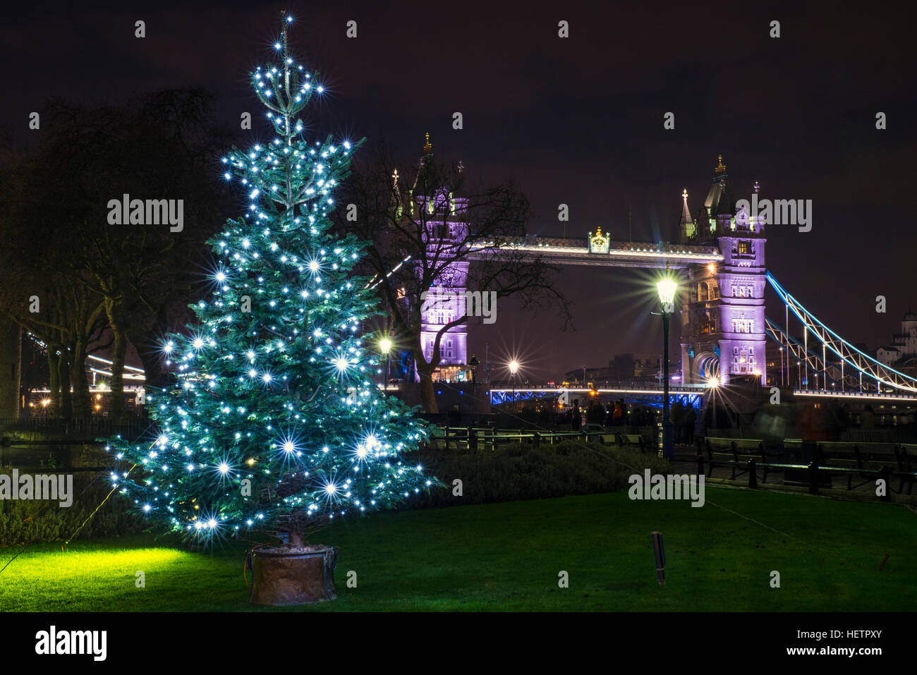 A view of a festive Christmas Tree with the iconic Tower Bridge in the ...