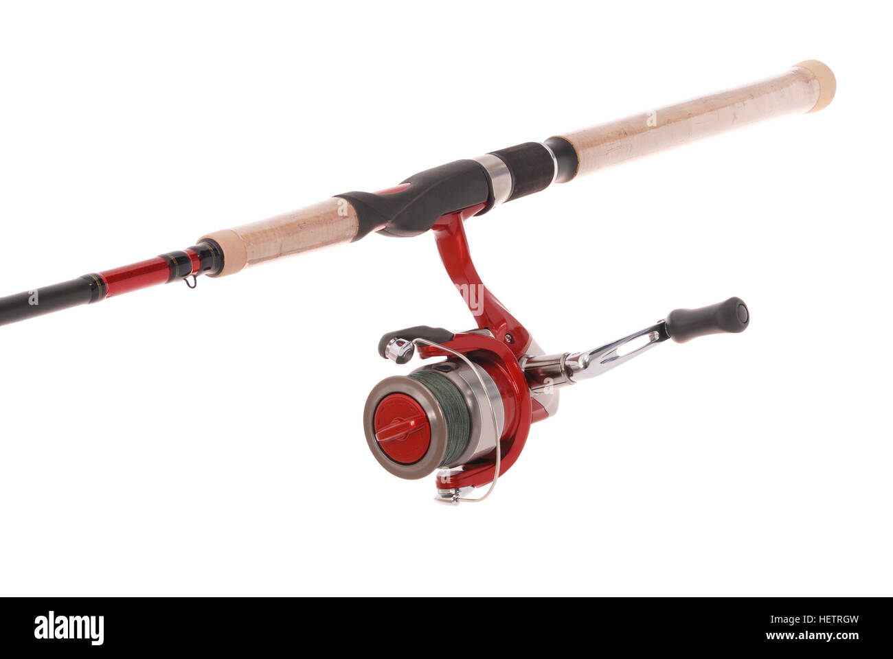 Fishing rod with a reel isolated on white background Stock Photo - Alamy