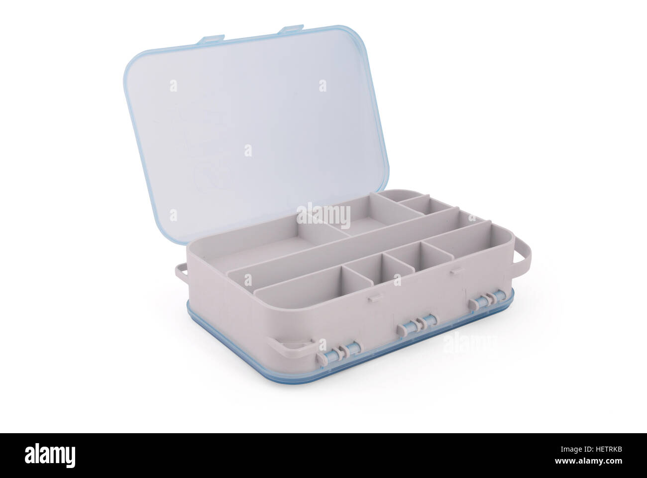 Opened white plastic box for fishing tackle on an isolated white ...