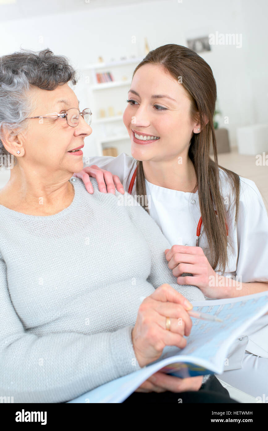 Doctor doing a home visit Stock Photo - Alamy