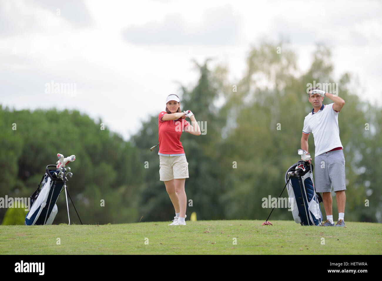people playing golf Stock Photo - Alamy