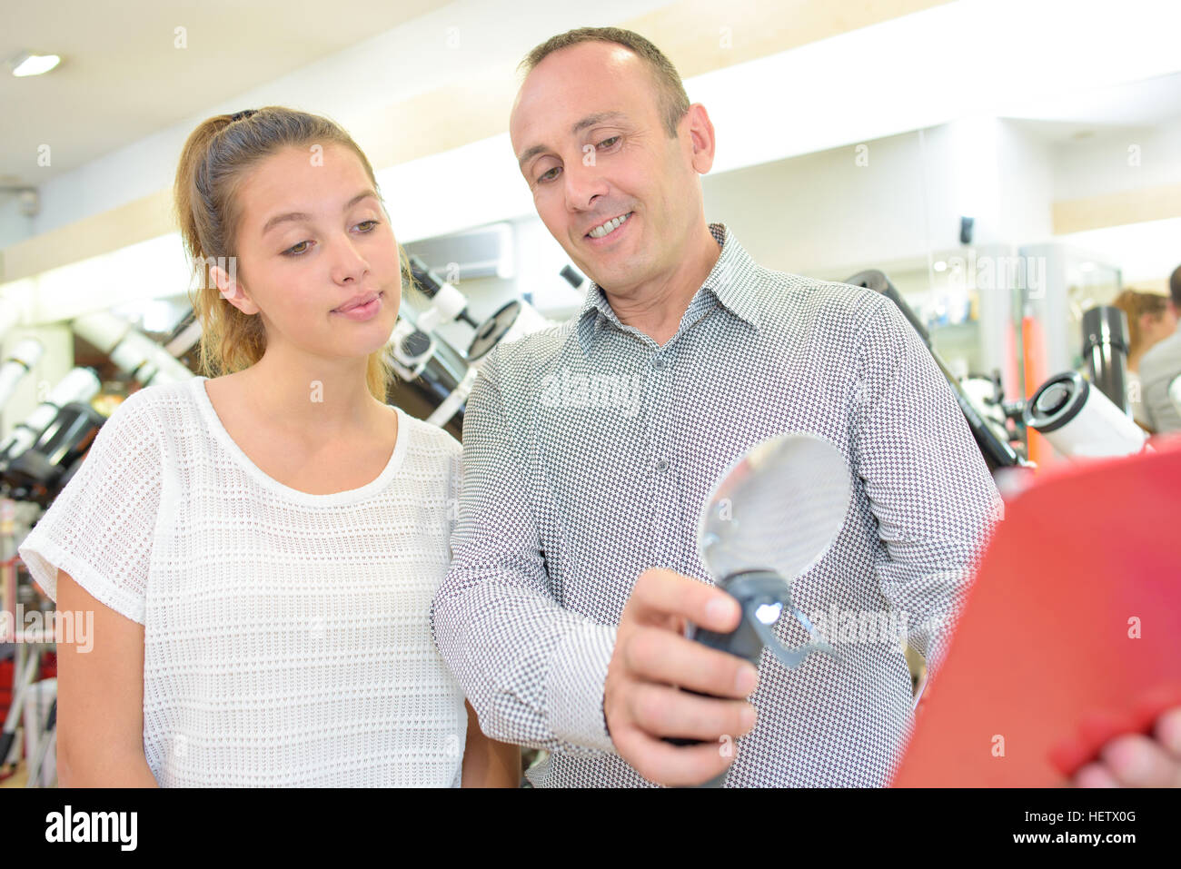 using magnifying glass Stock Photo - Alamy