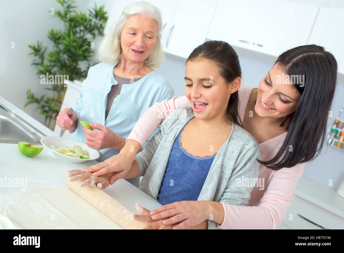 Family baking together Stock Photo - Alamy