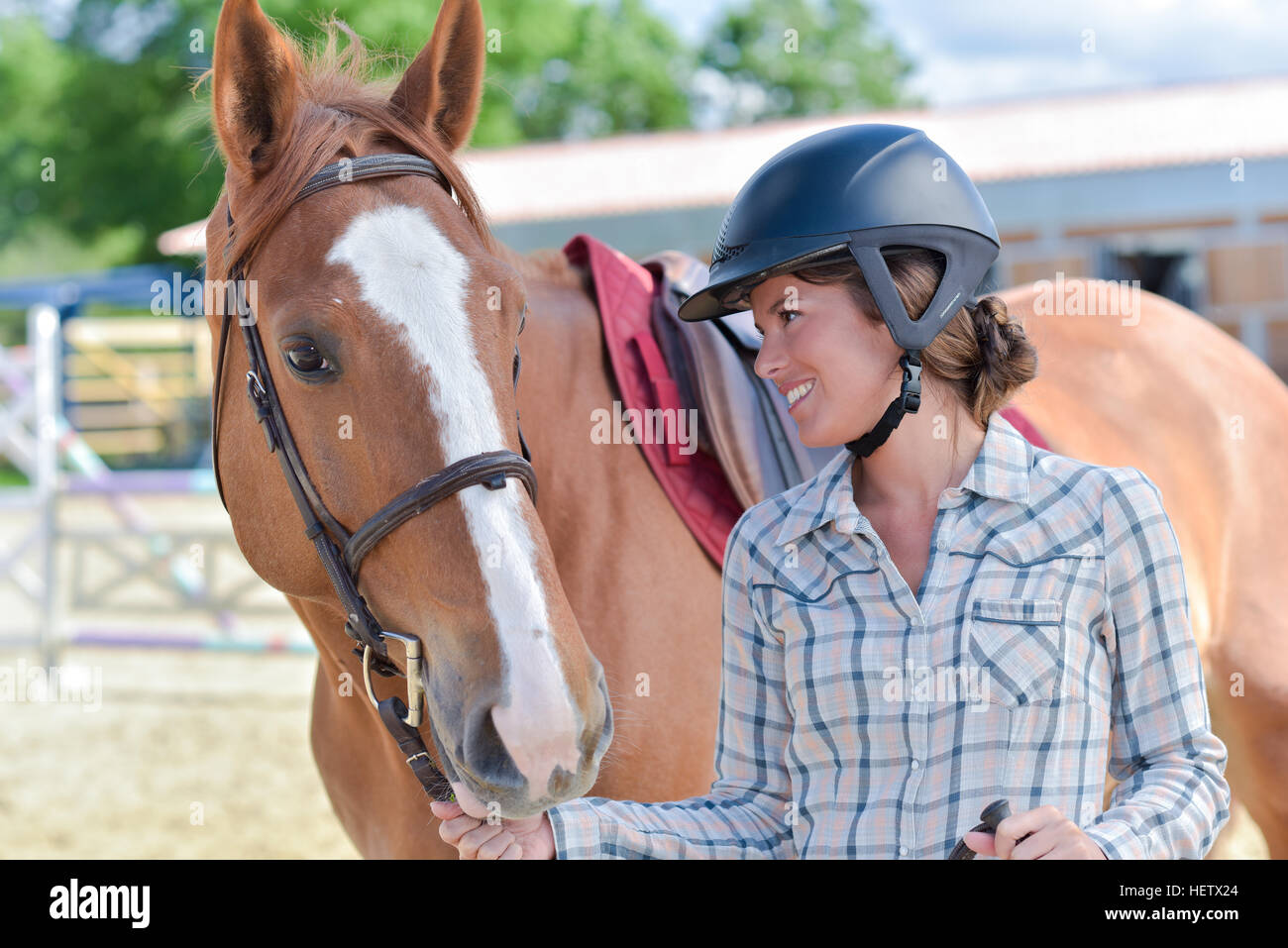 Lady leading horse Stock Photo - Alamy