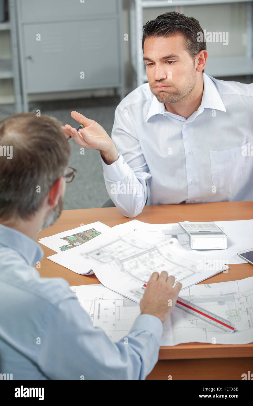 Colleague looks annoyed Stock Photo - Alamy
