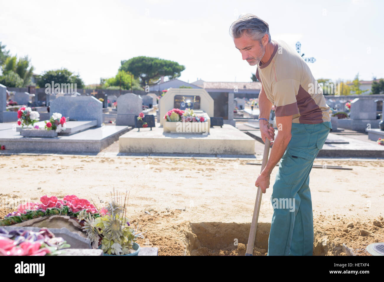 Grave digger hi-res stock photography and images - Alamy