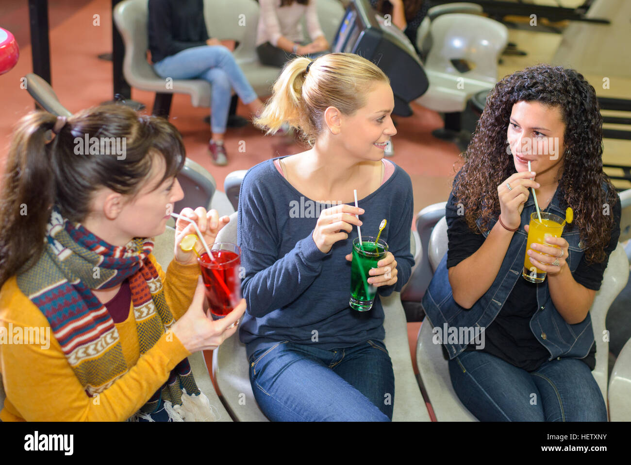 Sipping drink through straw hi-res stock photography and images - Alamy