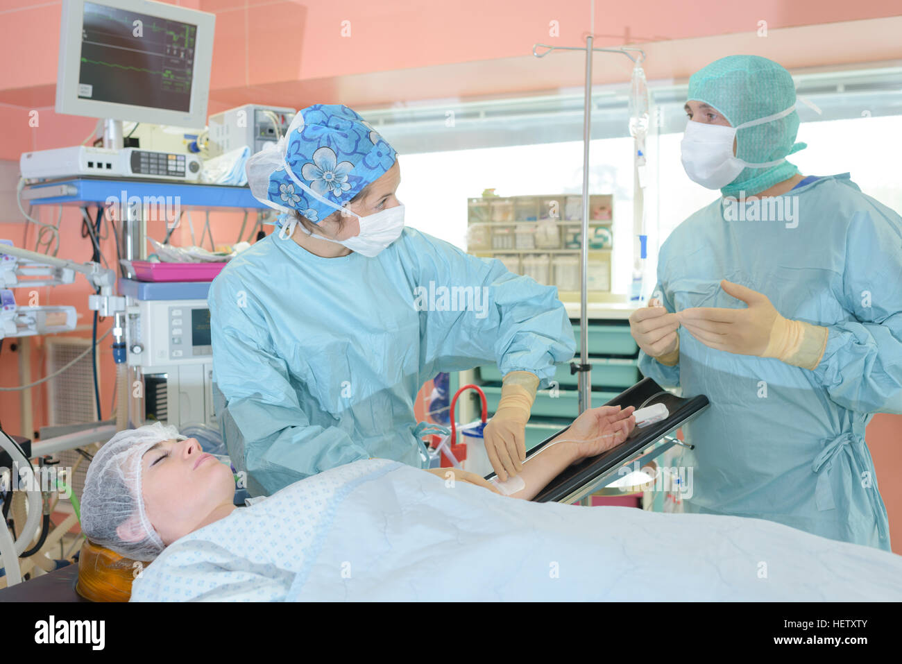 Woman in surgery Stock Photo - Alamy