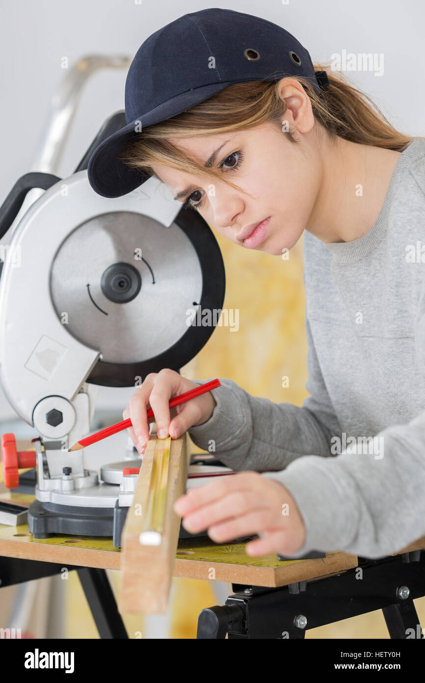 Young female carpenter at work Stock Photo - Alamy