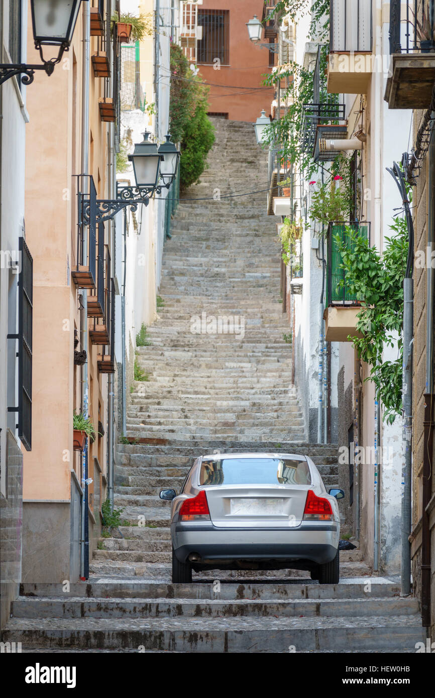Car and high slope street with stairs Stock Photo - Alamy