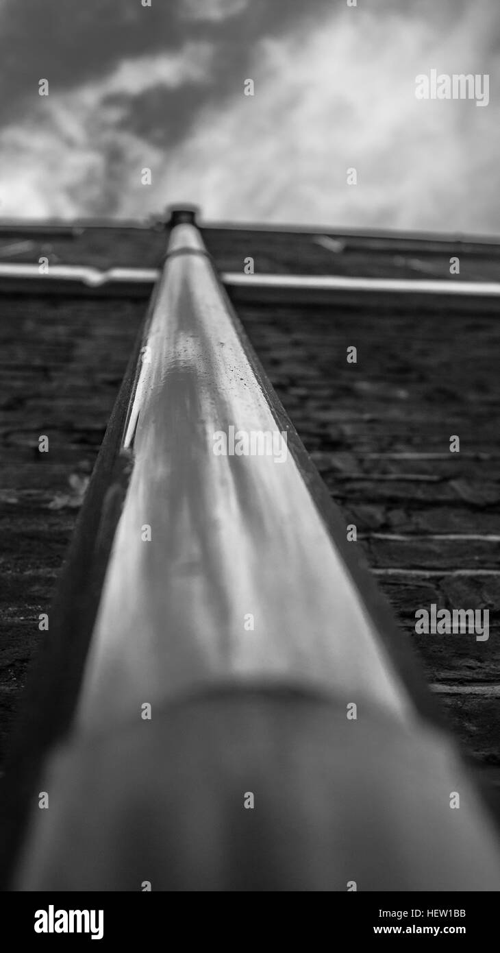 Low angle shot looking up of pipes and lamp posts Stock Photo - Alamy