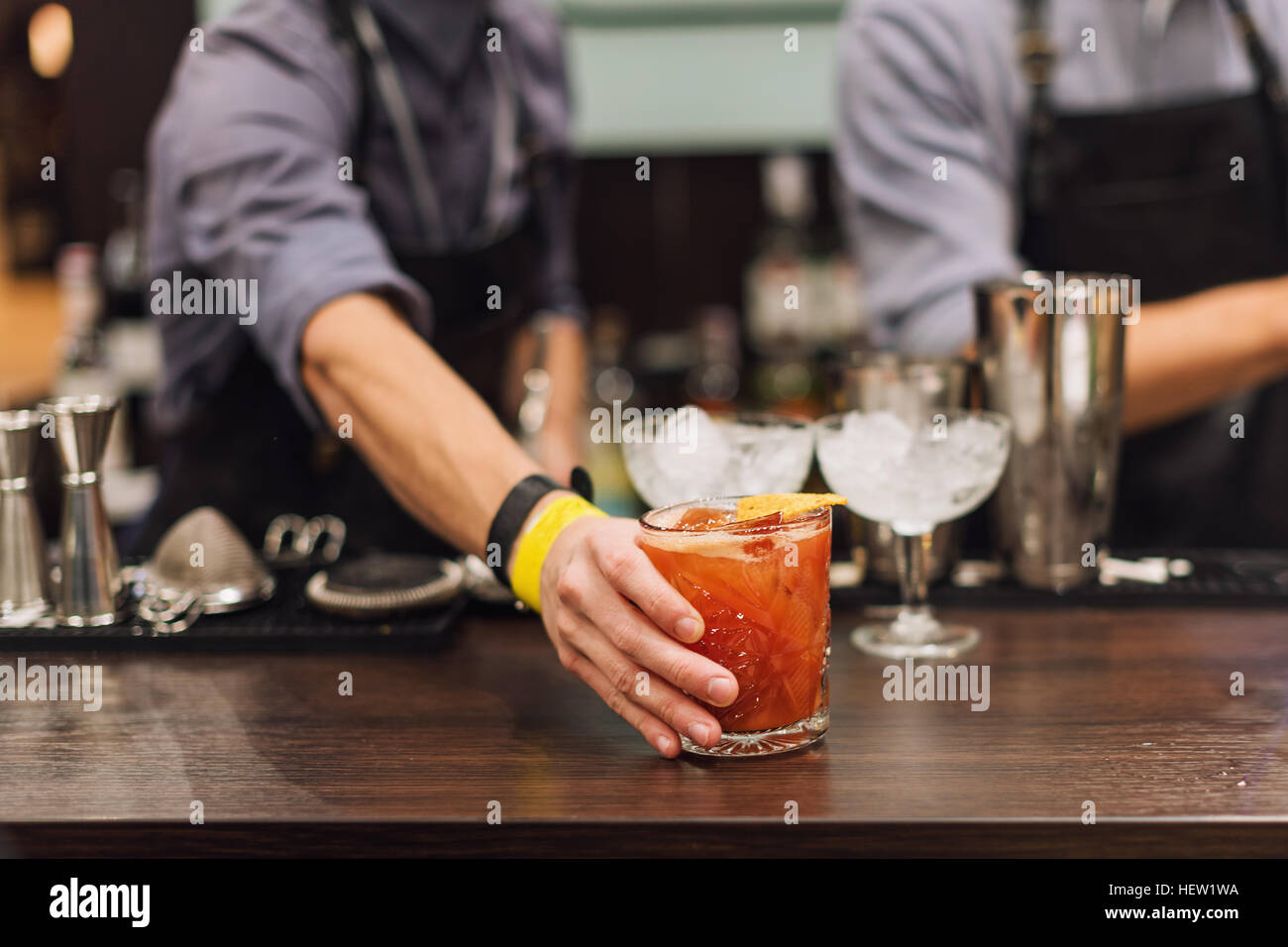 Barman show. Bartender is making cocktail at night club Stock Photo - Alamy