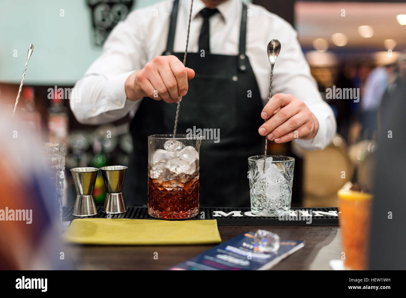 Barman show. Bartender is making cocktail at night club Stock Photo - Alamy