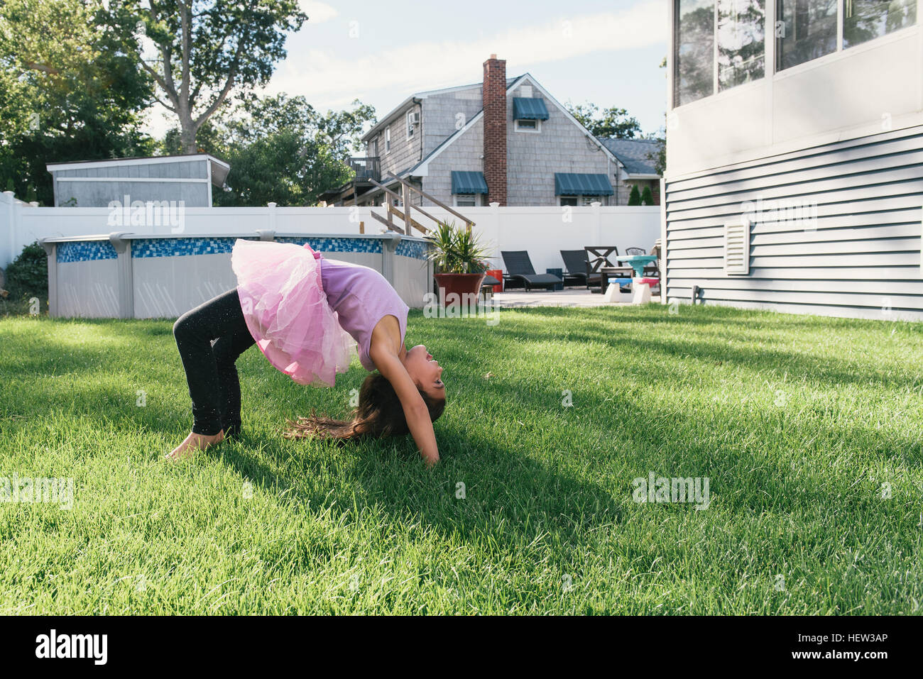 Girl Bending Over Backwards High Resolution Stock Photography and ...