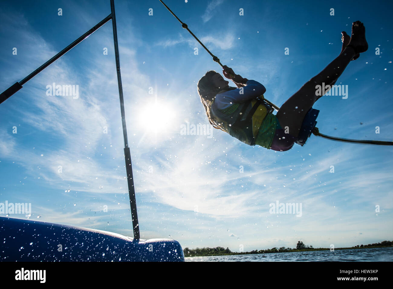 Girl swinging on rope, Seaside Heights, New Jersey, USA Stock Photo - Alamy