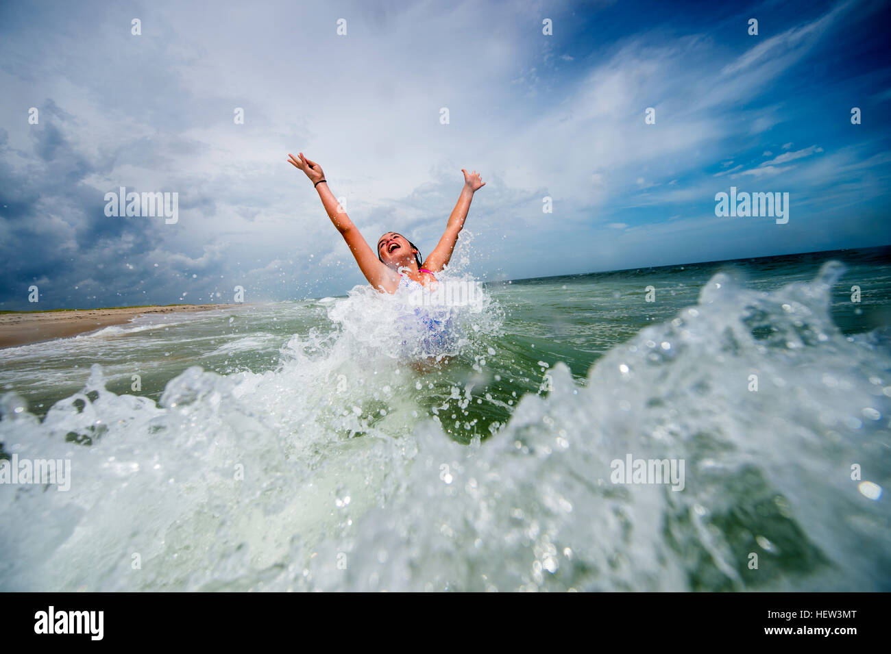 Child jumping with joy hi-res stock photography and images - Alamy