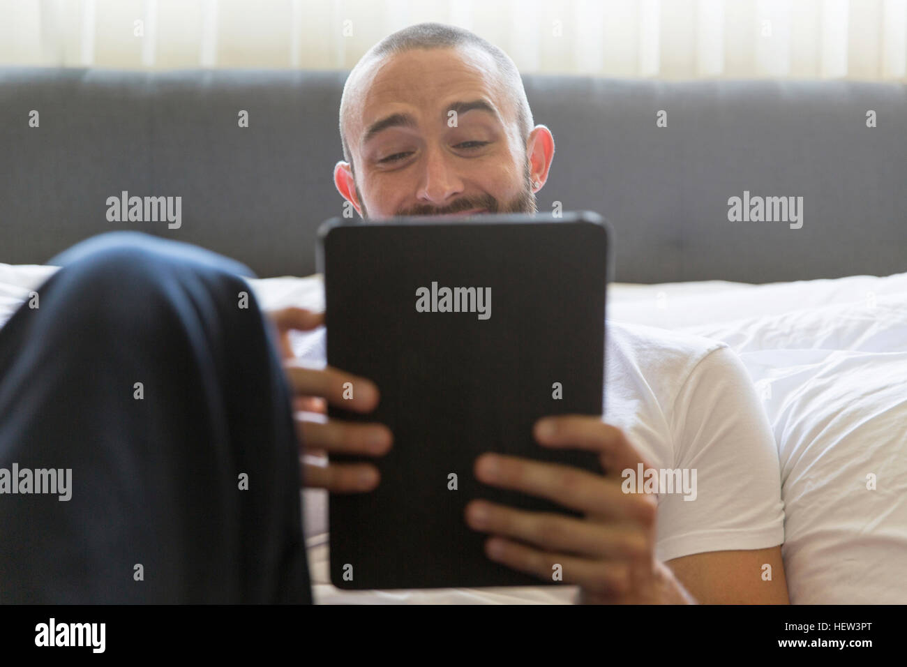 Leaning Against The Bed High Resolution Stock Photography and Images ...