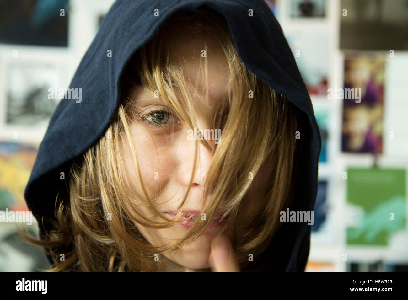 Boy wearing hood hi-res stock photography and images - Alamy