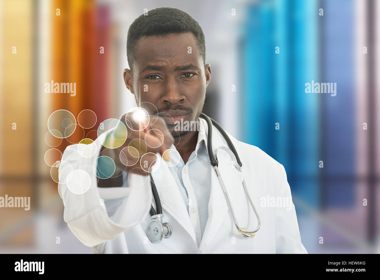 Angry african black male doctor pointing finger at you with stethoscope ...