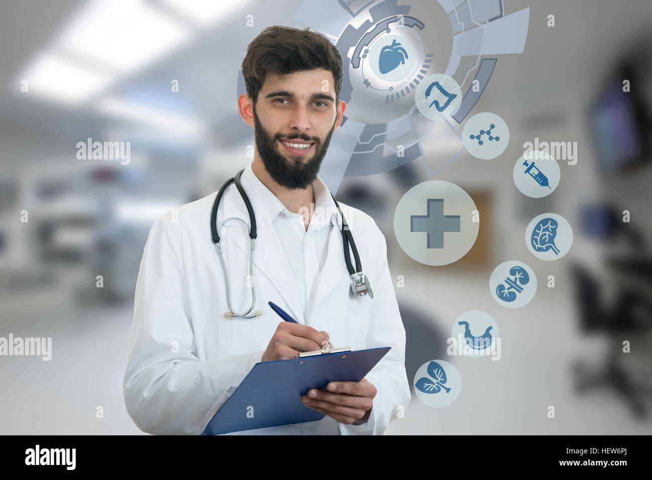 Smiling young doctor with beard holding paperclip with medical symbols ...