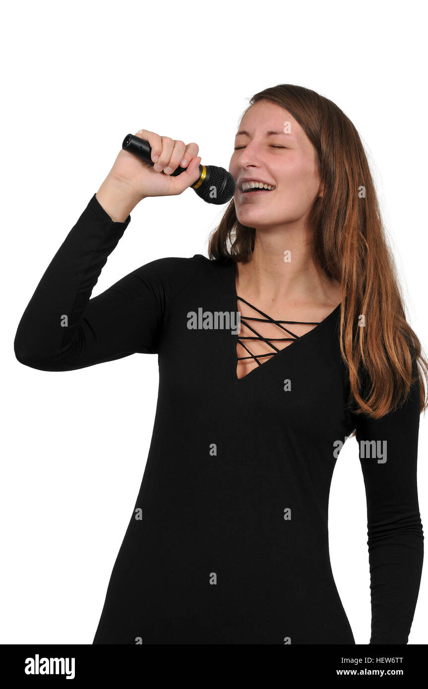 Beautiful woman singer performing at a concert Stock Photo - Alamy