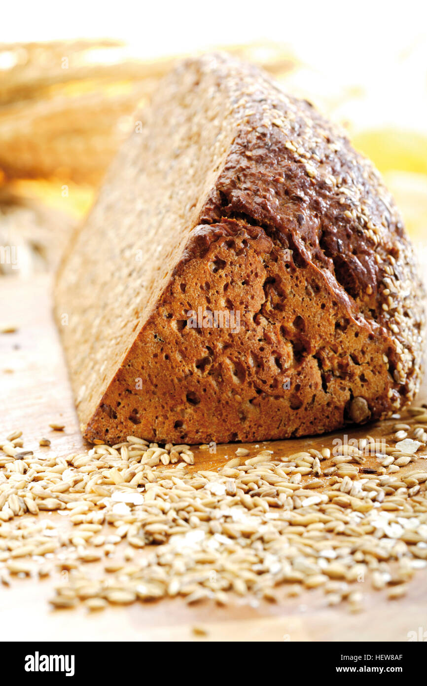 Triangular loaf of wholegrain bread Stock Photo - Alamy