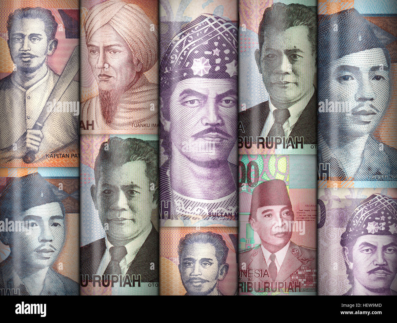 Different money bills stacke over each other forming a money wall Stock ...