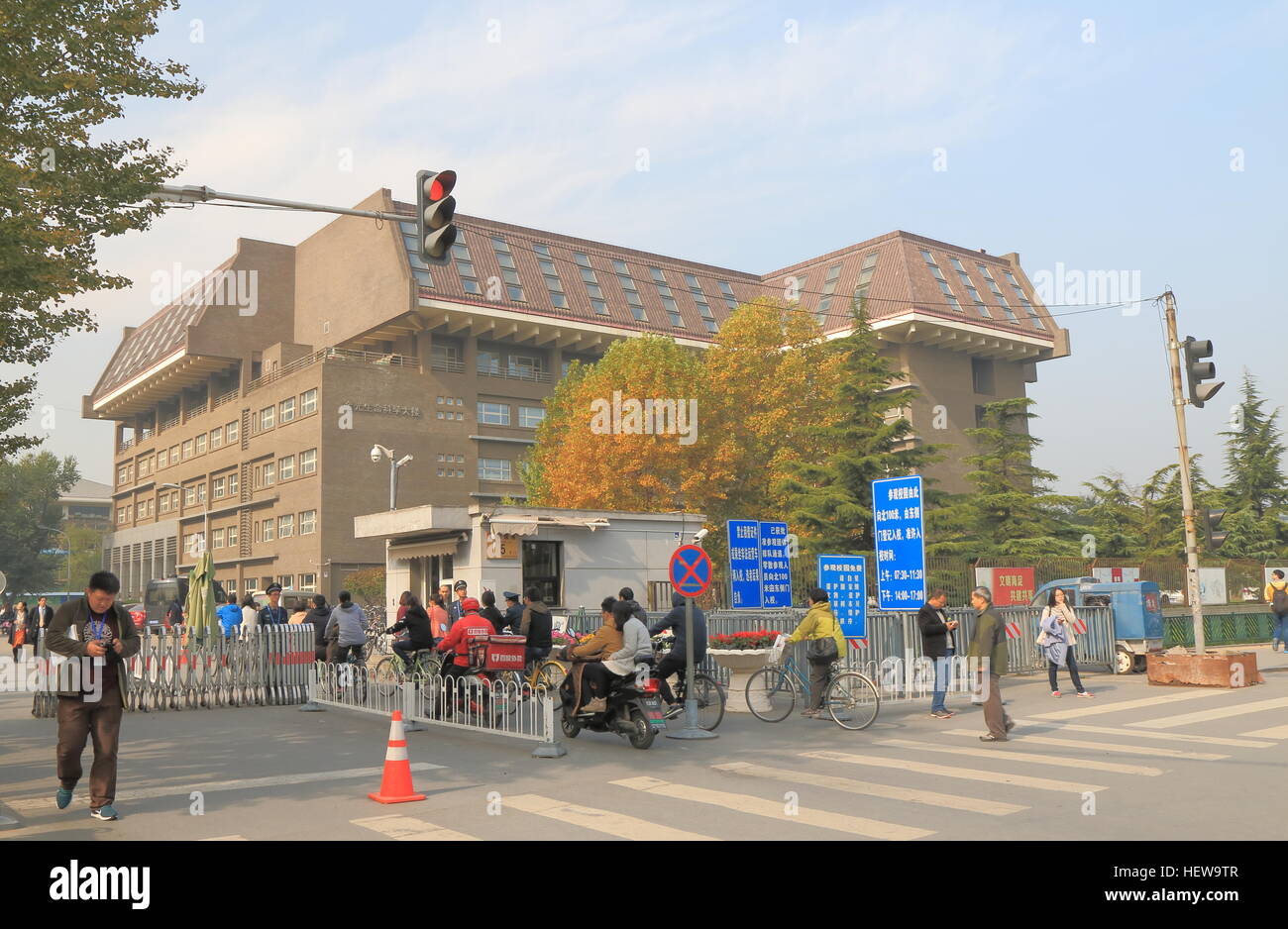 People visit Peking University in Beijing China. Peking University is ...