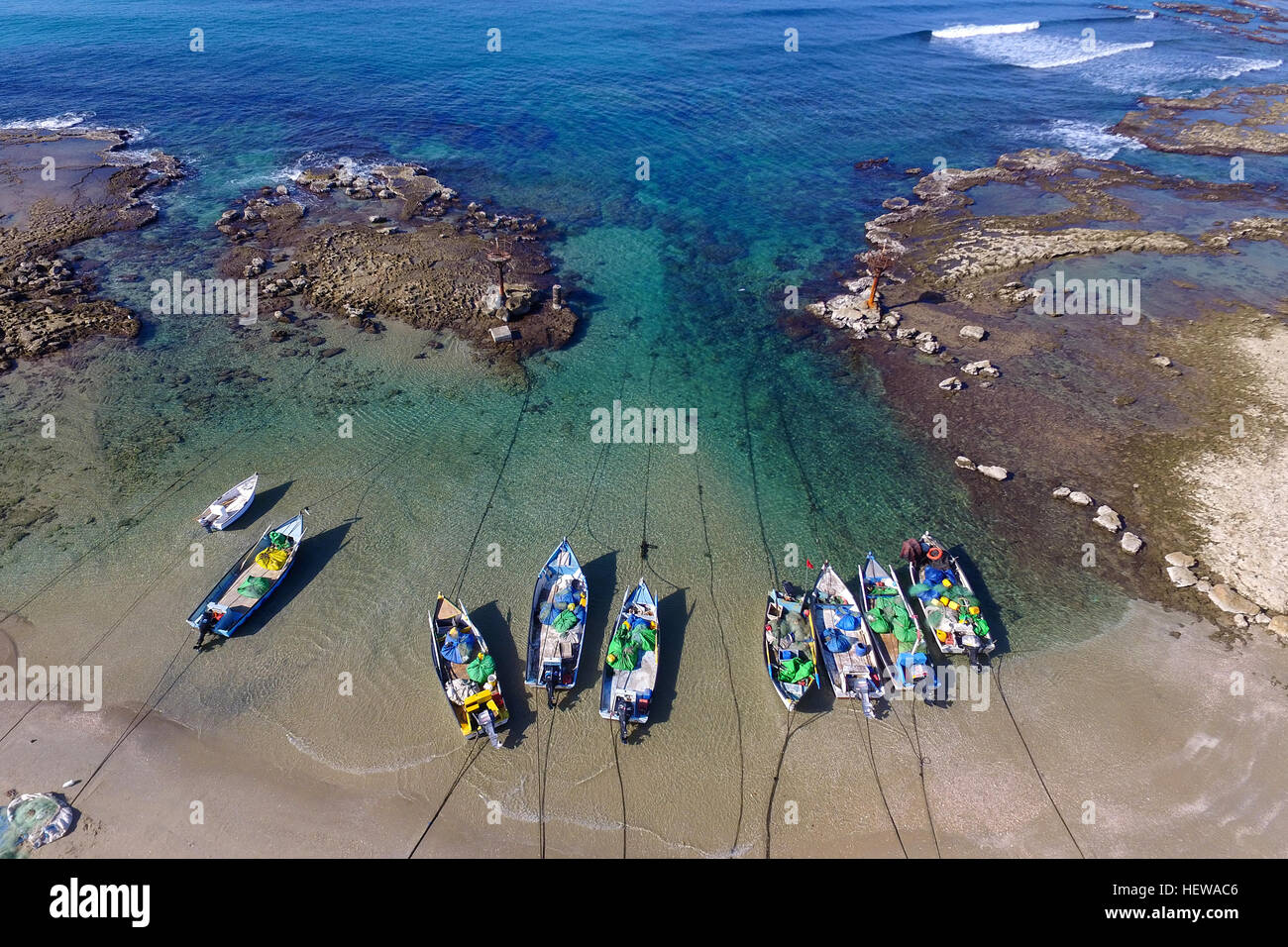 Small fishing boats on a tropical beach - Aerial Image Stock Photo - Alamy
