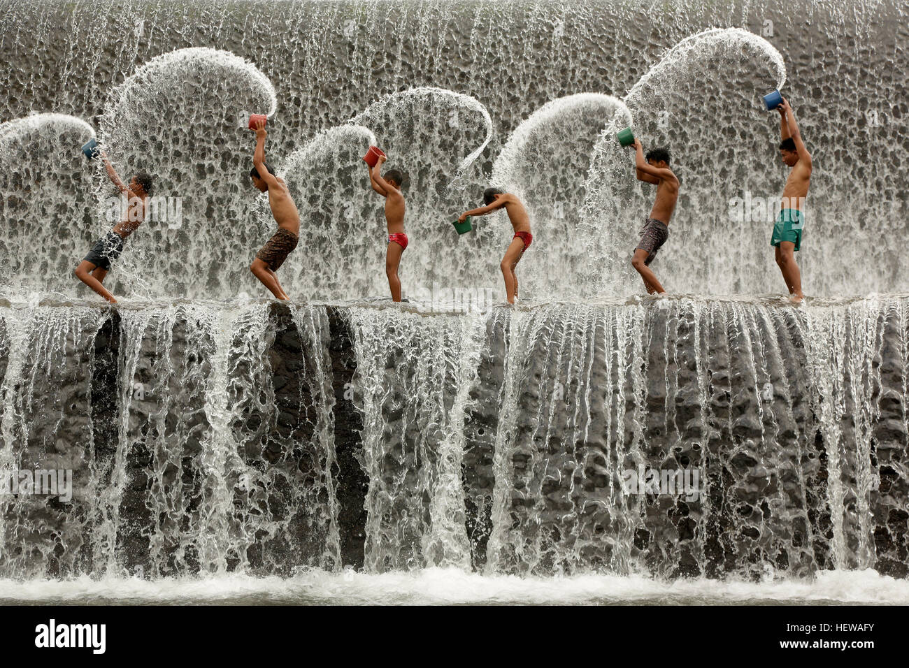 Children leap into lake hi-res stock photography and images - Alamy
