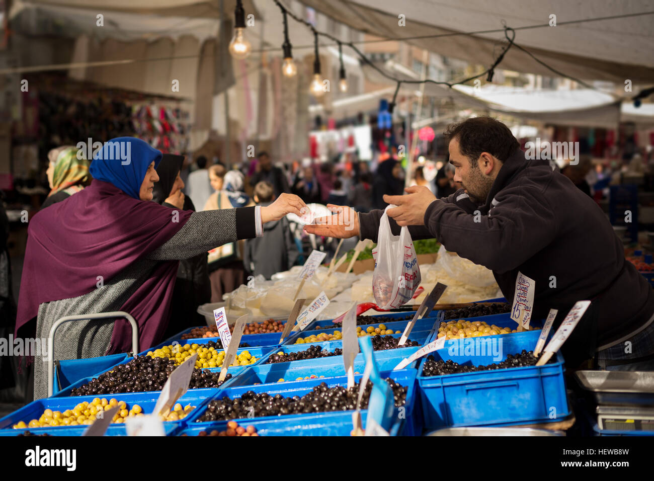 Traditional street market of Istanbul. People shop comparatively ...