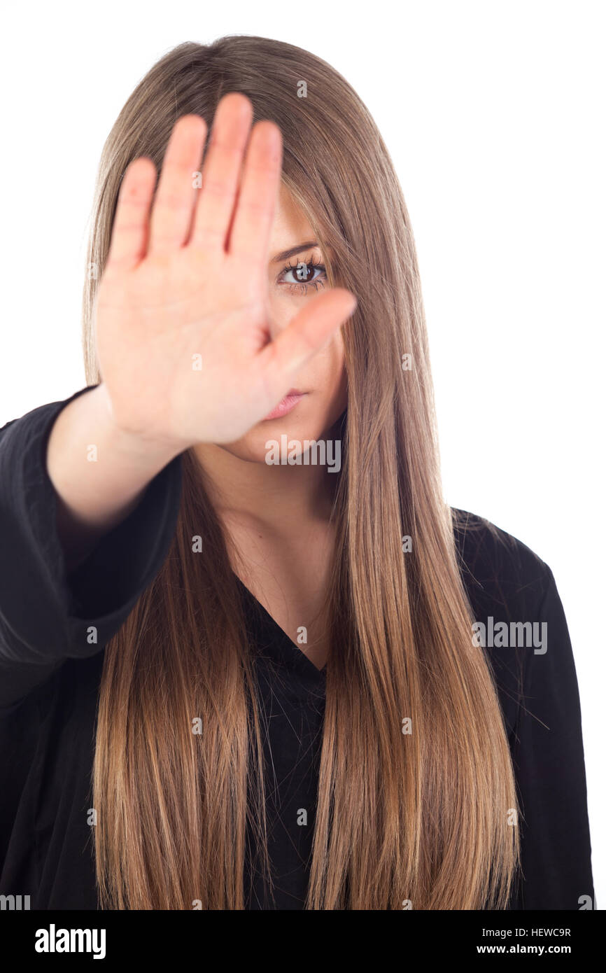 Pretty young girl making stop sign isolated on a white background Stock ...