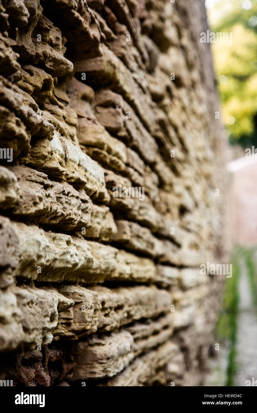 Detail of an ancient eroded stone wall Stock Photo - Alamy