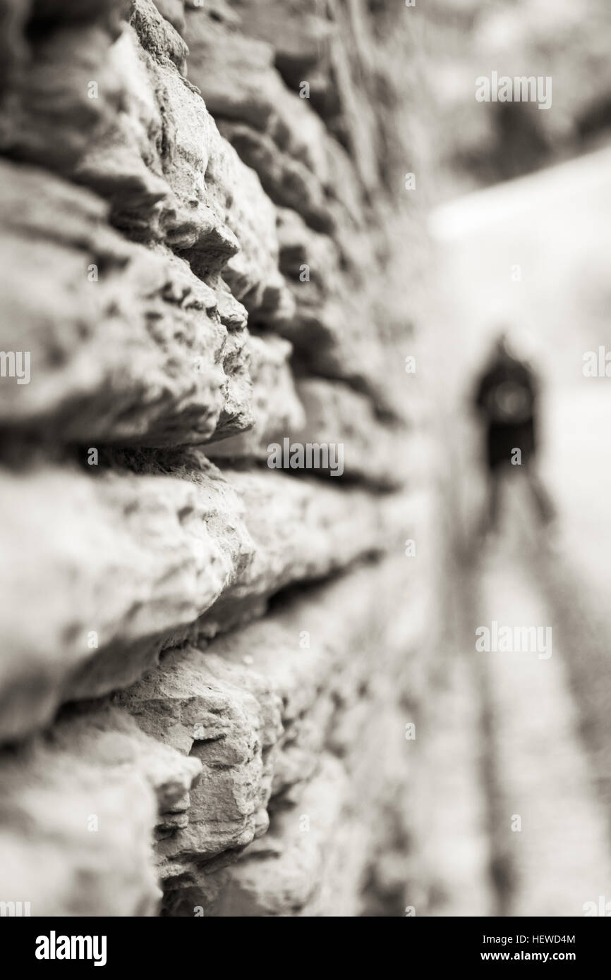 Detail of an ancient eroded stone wall Stock Photo - Alamy