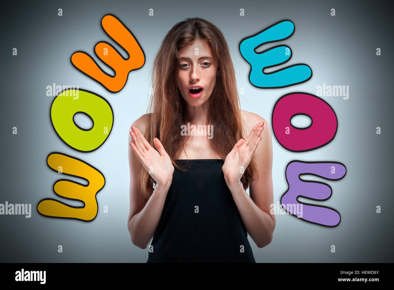 Portrait of young woman with shocked facial expression Stock Photo - Alamy
