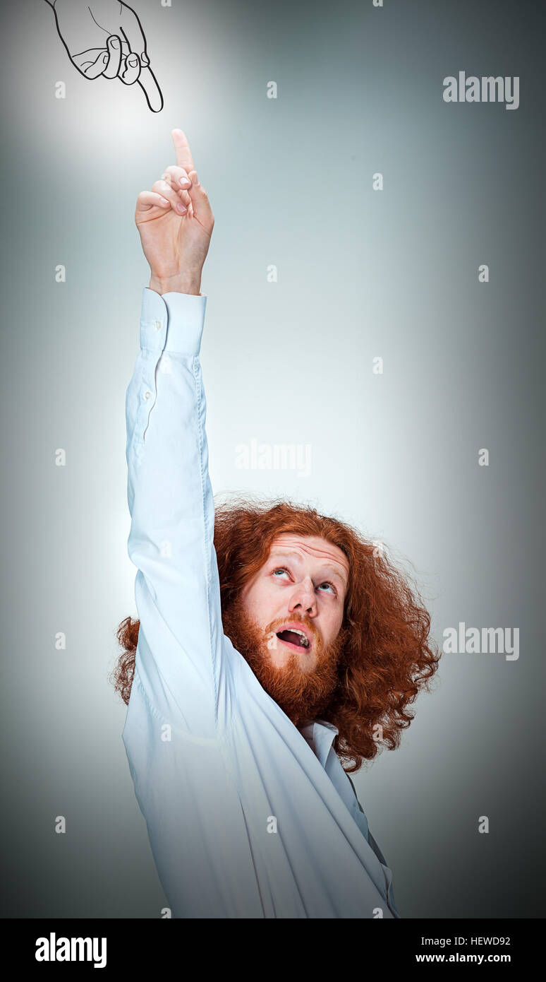Portrait of young man with shocked facial expression Stock Photo - Alamy