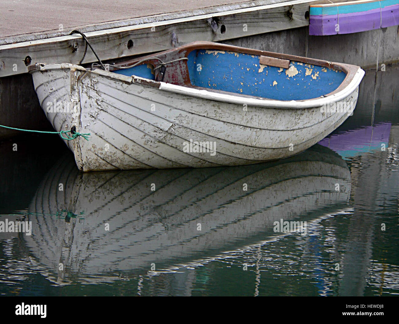 A maritime scene featuring various elements of a ship’s equipment ...