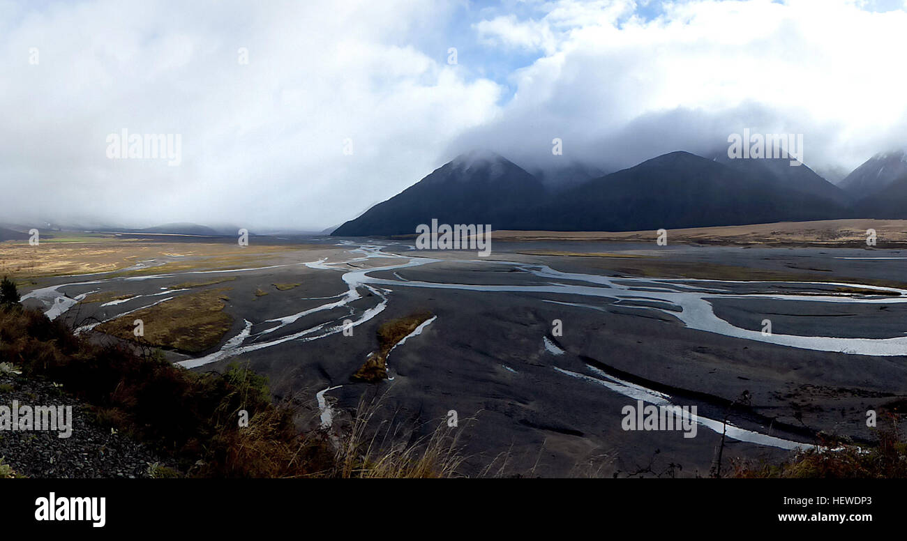Braided rivers, characterized by multiple shifting channels, are common ...
