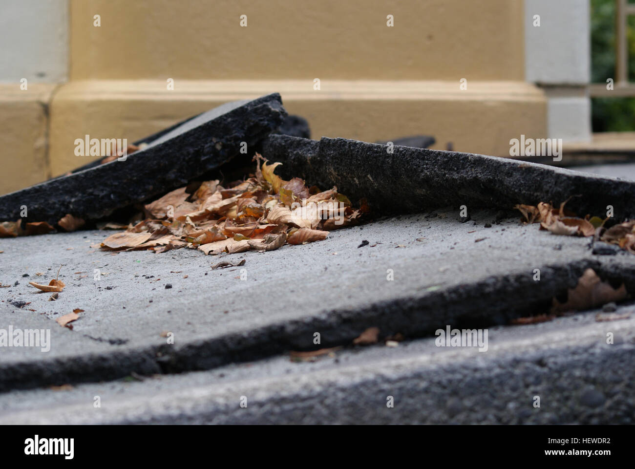 This image depicts the aftermath of an earthquake, with visible ...